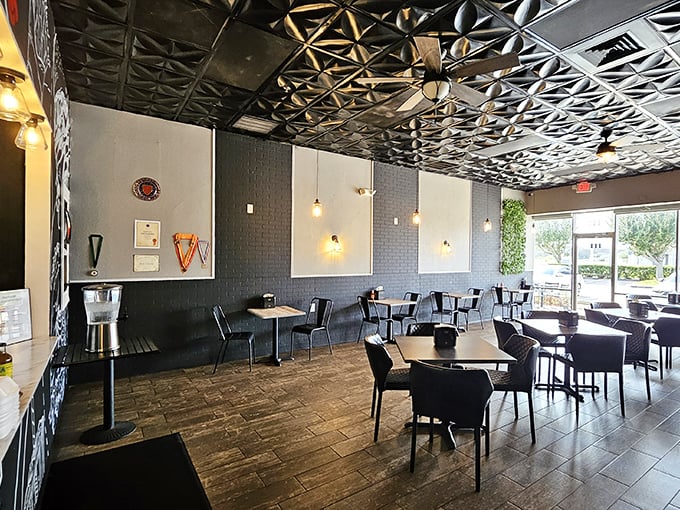 Modern meets cozy with that eye-catching textured ceiling. The kind of place where your burger comes with a side of style.