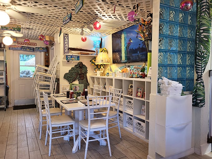 White lattice ceilings, tropical decor, and beach-cottage charm—this isn't just a dining room, it's Florida's breakfast happy place.