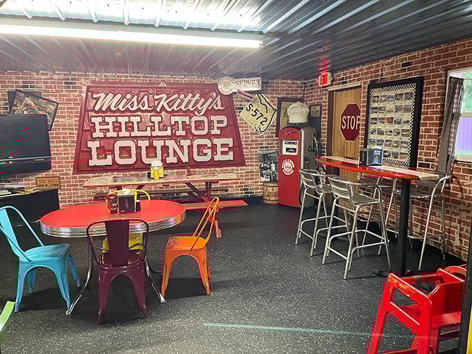 Miss Kitty's Hilltop Lounge offers a colorful retreat with its brick walls, vintage signs, and those impossibly cheerful metal chairs that somehow make everything taste better.