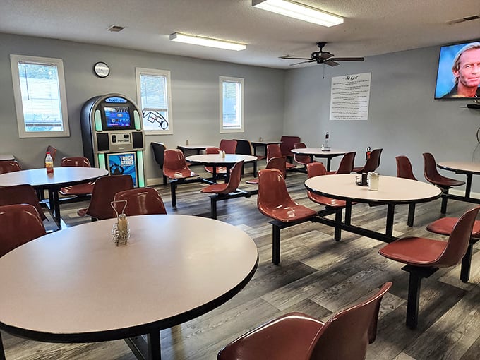 Simple tables, practical seating, and a jukebox that's seen decades of hits—this is where food, not frills, does all the talking.