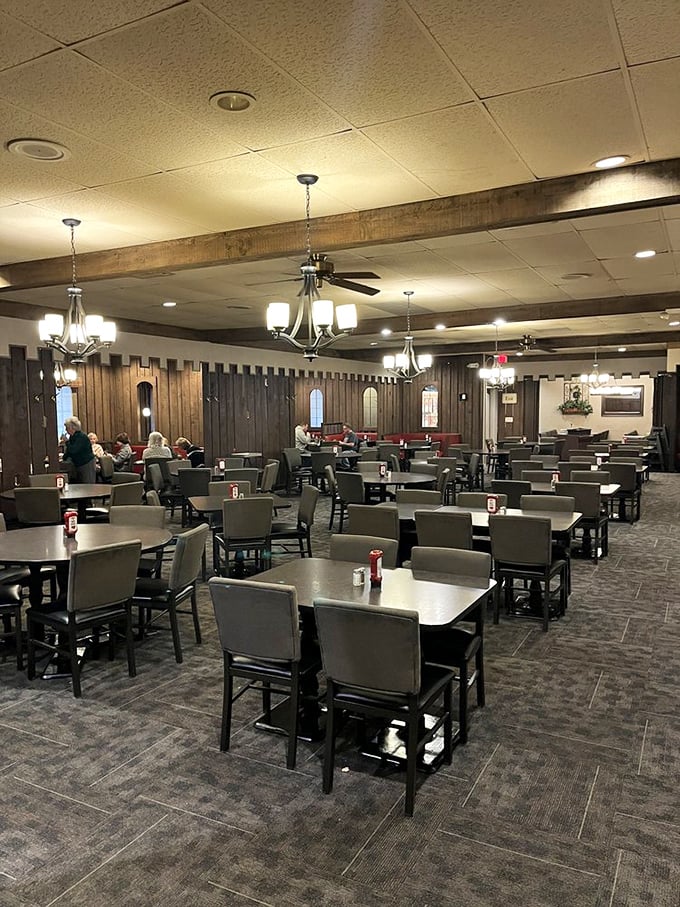 Step inside and you're transported to the golden age of steakhouses—wood paneling, chandeliers, and comfortable seating that invites you to settle in for a proper meal.
