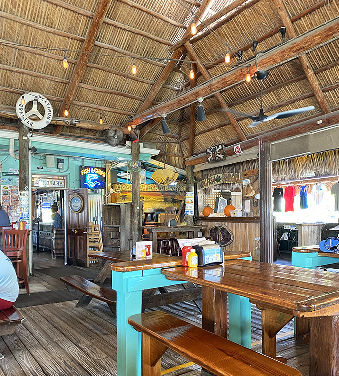 The tiki-hut ceiling isn't just charming decor—it's a promise that whatever happens under it will be deliciously unforgettable and authentically Keys.