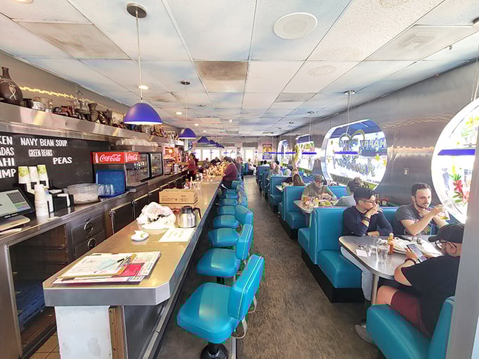 Classic diner magic unfolds inside Rudford's, where turquoise vinyl booths have witnessed countless first dates, family celebrations, and late-night philosophical debates fueled by endless coffee.