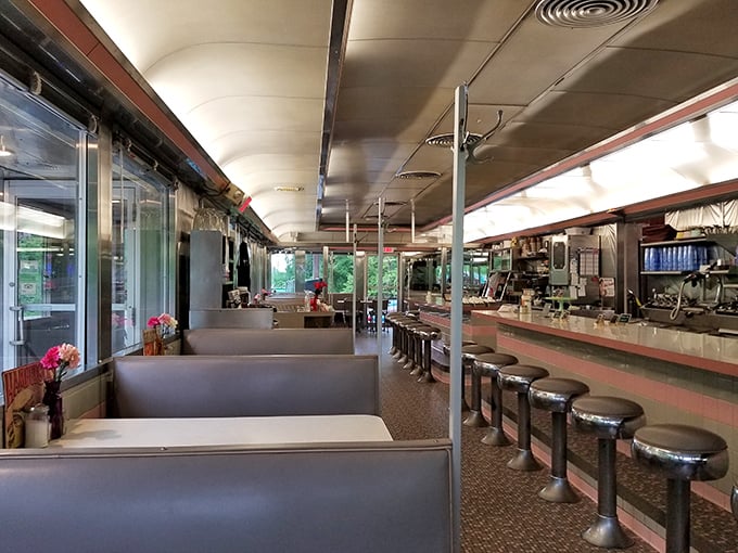 Step inside and suddenly you're in an Edward Hopper painting with better food options. Those counter stools have heard a million stories.