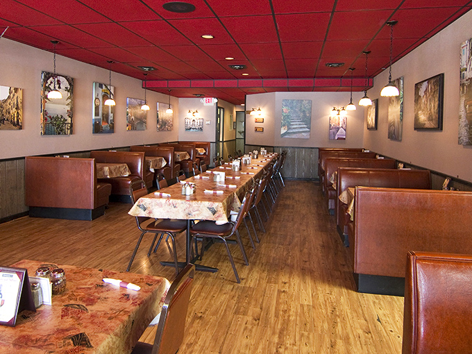 Red ceiling, wooden floors, and those classic checkered tablecloths – walking into Giovanni's feels like being wrapped in a warm Italian hug.