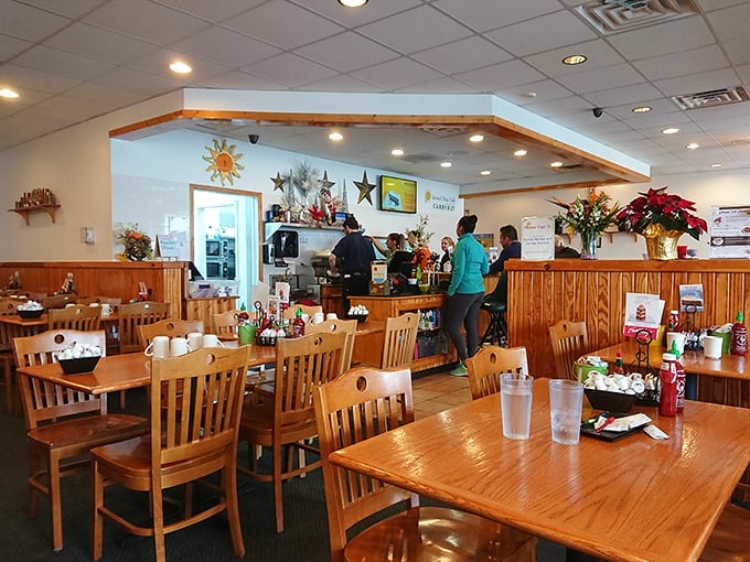 Wooden paneling and sun motifs create that classic diner warmth—the kind of place where coffee refills arrive before you even realize you need one.