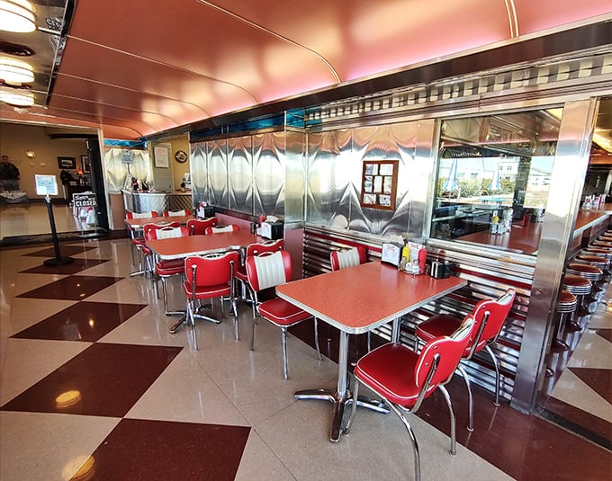 Step inside where red vinyl meets chrome perfection, and every seat promises culinary magic ahead.2. interior
