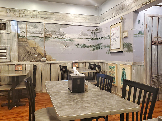 Hand-painted Florida landscapes adorn walls where countless comfort food conversations have unfolded. This isn't décor—it's a visual love letter to Old Florida.