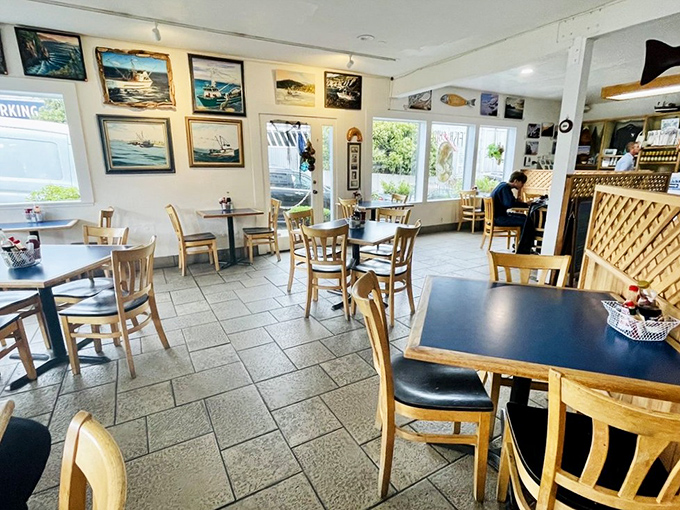 Maritime memories line the walls as sunlight floods the dining room. This isn't designer-magazine decor—it's the authentic backdrop to some of Monterey's freshest seafood conversations.