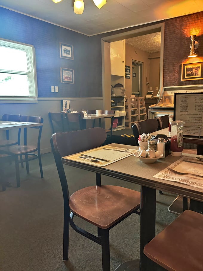 Blue walls, wooden chairs, and zero pretension—Fred's interior feels like stepping into a time machine where comfort trumps trendiness every single time.