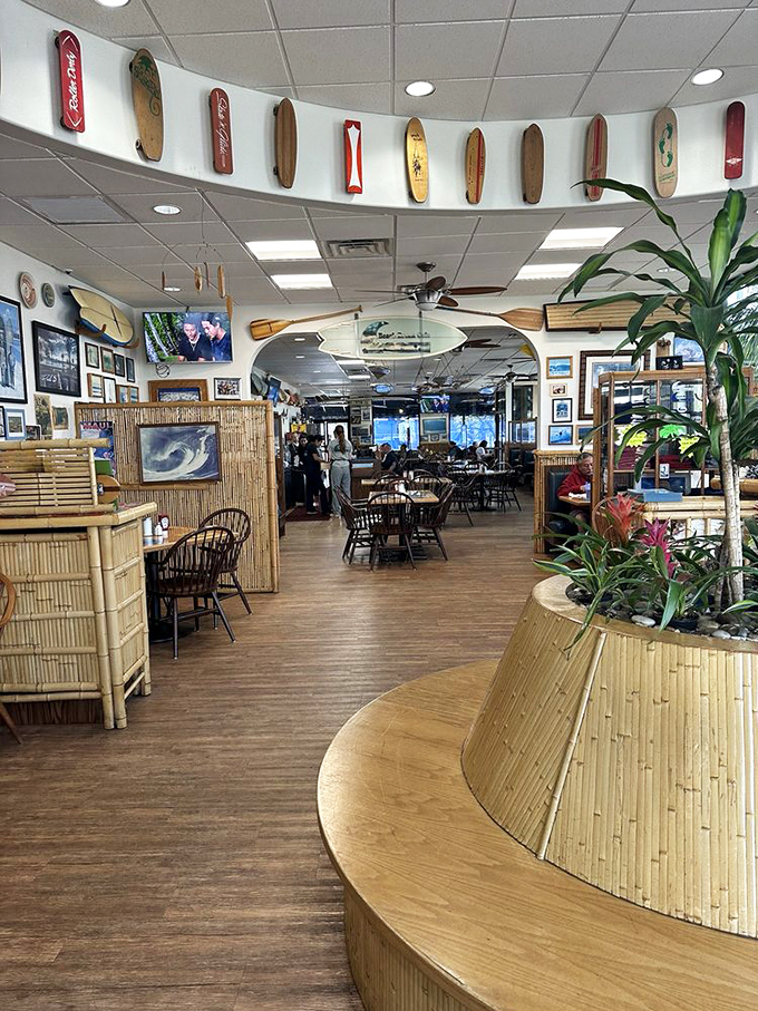 Vintage surfboards create a canopy of California cool, while bamboo accents and tropical plants transport you to a breakfast paradise.