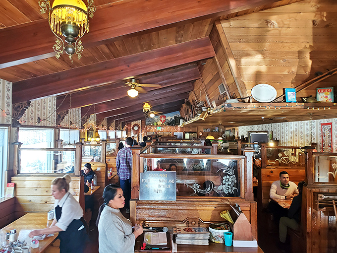 Wooden beams, vintage lamps, and that unmistakable buzz of happy diners—this is what breakfast paradise looks like in the mountains.