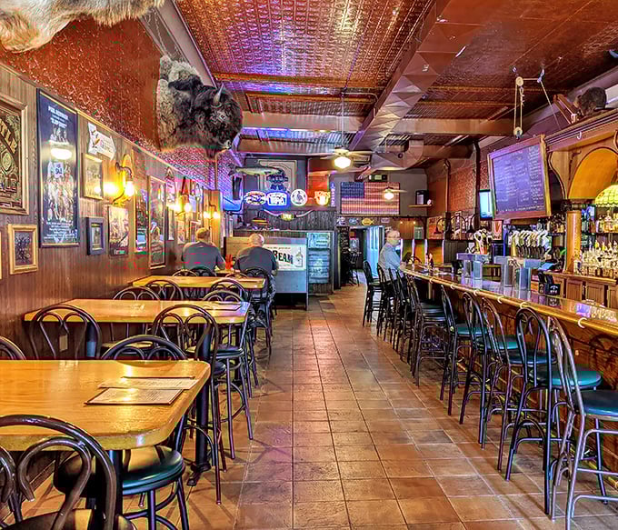 Step inside and you're transported to tavern nirvana—copper ceiling tiles gleam above while decades of Wisconsin memories line the walls.
