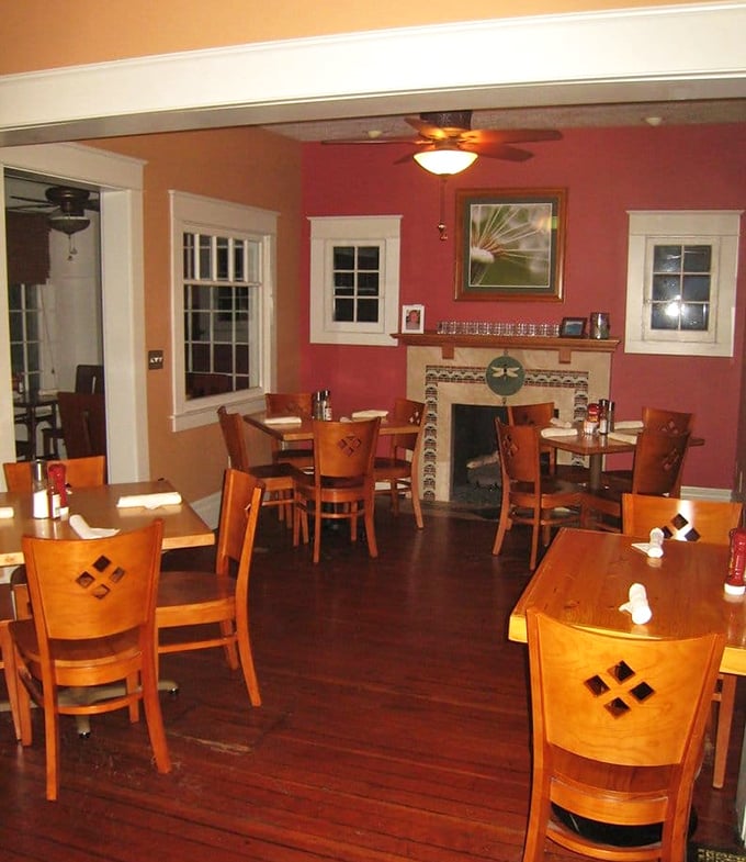 Cozy doesn't begin to cover it. The original fireplace and warm red walls make you feel like you're dining in someone's beloved home—someone who really knows how to cook.