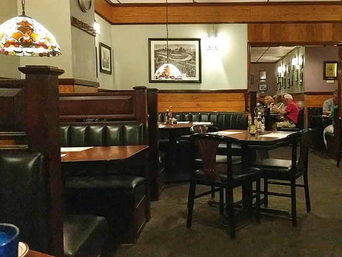 Those vintage booths have heard more stories than a bartender at closing time.