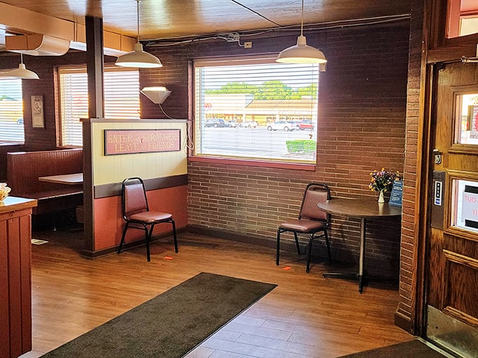 Simple wood paneling and no-nonsense seating tell you everything: this place puts its energy into the chicken, not interior design magazines.