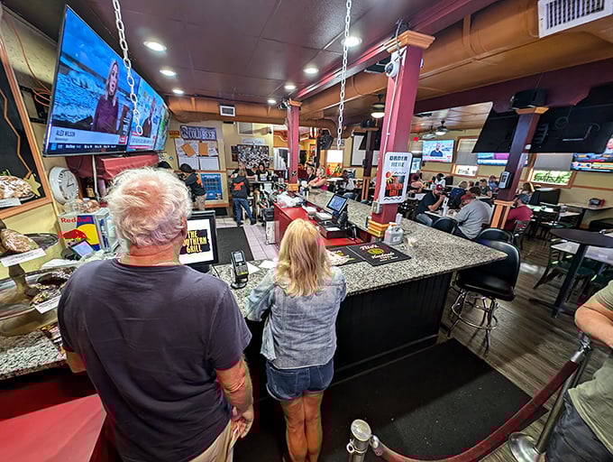 Where the magic happens. The bustling counter service area is command central for Southern Grill's smoky delights, with patrons eagerly awaiting their turn at barbecue bliss.