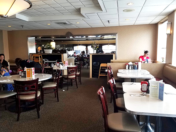 Classic booths and tables create that perfect diner atmosphere—not too fancy, not too casual, just right for everything from power breakfasts to late-night comfort food.