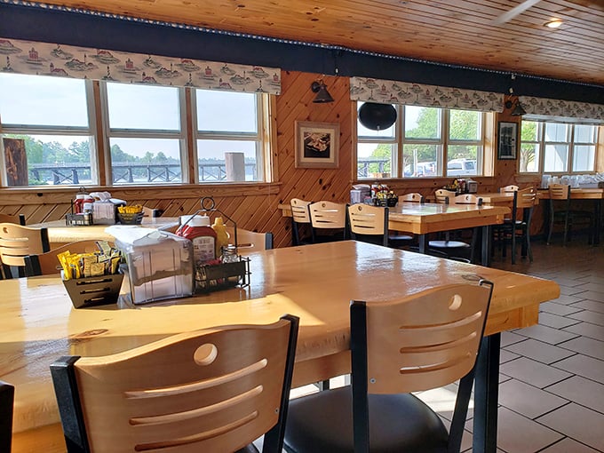 Knotty pine walls and windows framing lake views create the perfect Northwoods dining atmosphere – like eating in a comfortable cabin with someone else doing all the cooking.