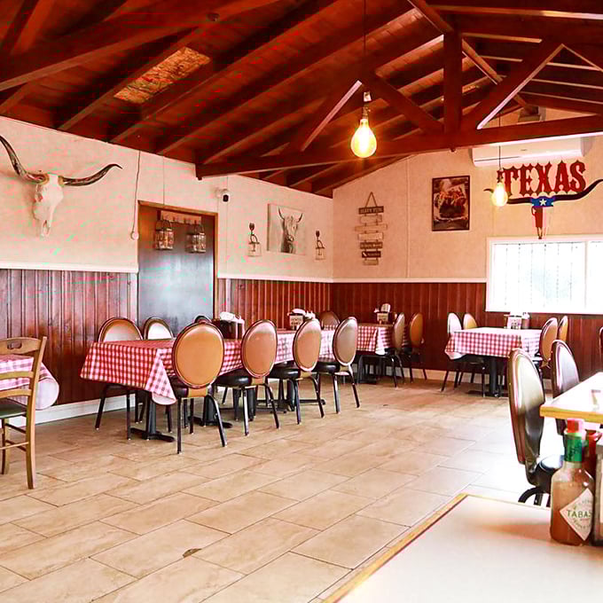 Exposed beams and longhorn skulls create the perfect Texas atmosphere where every meal feels like a celebration.