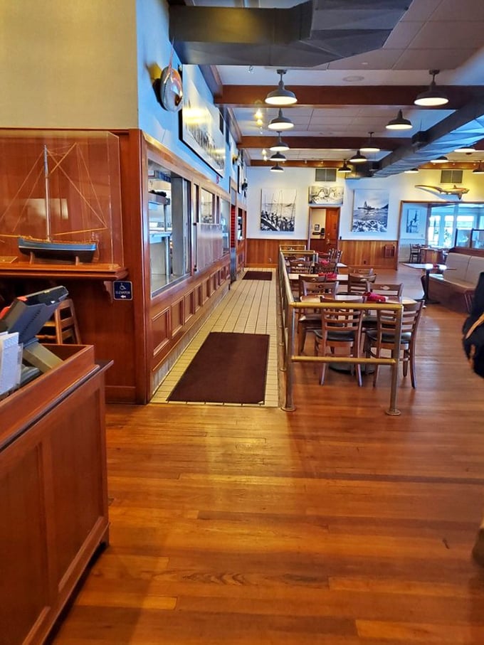 Step inside and breathe deep – that warm wood interior isn't trying to impress anyone, which is precisely why it does.