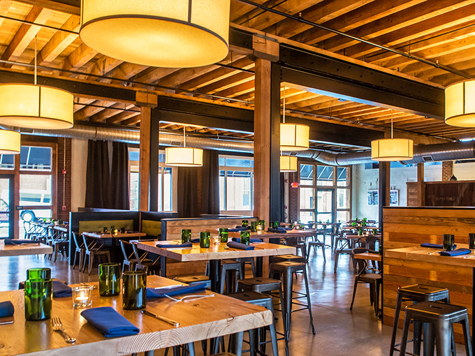 Industrial chic meets warm hospitality in this thoughtfully designed space. Those wooden beams have witnessed more food epiphanies than a cooking show marathon.