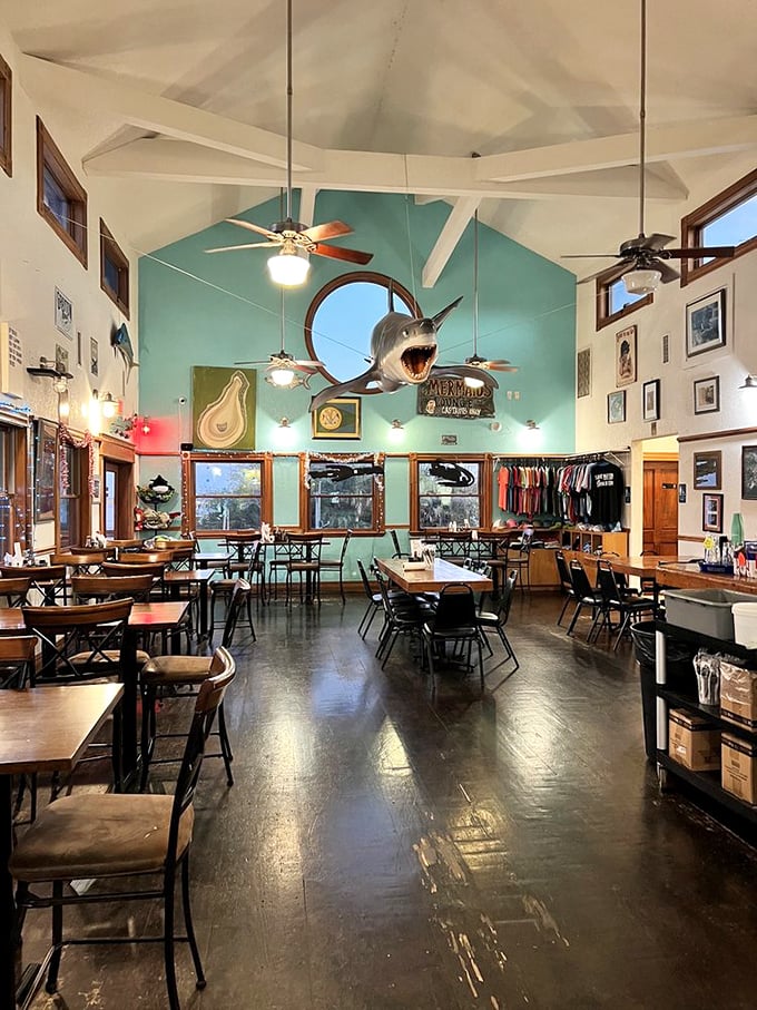 High ceilings, seafoam walls, and that watchful shark create the perfect backdrop for seafood indulgence. Even the shark looks hungry!