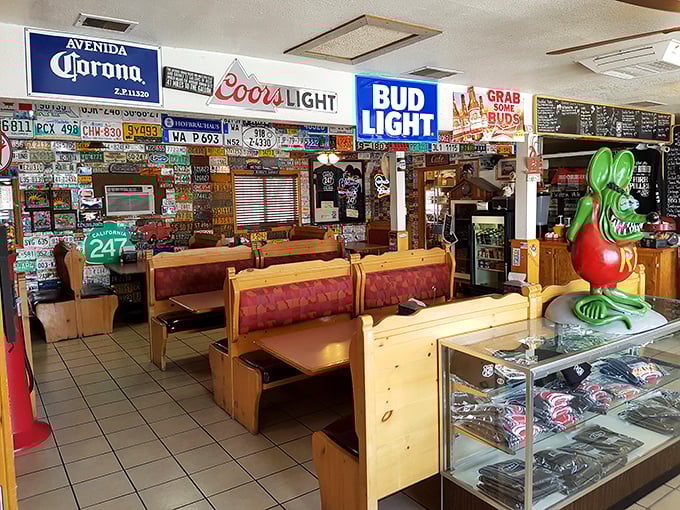 License plates from across America line the walls, telling the silent stories of countless road trips that led hungry travelers to this desert oasis.