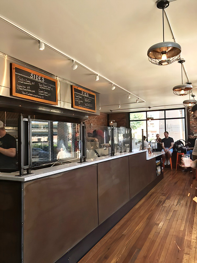 Inside, warm wooden floors and industrial lighting create the perfect backdrop for a fried chicken pilgrimage. Simplicity with purpose.