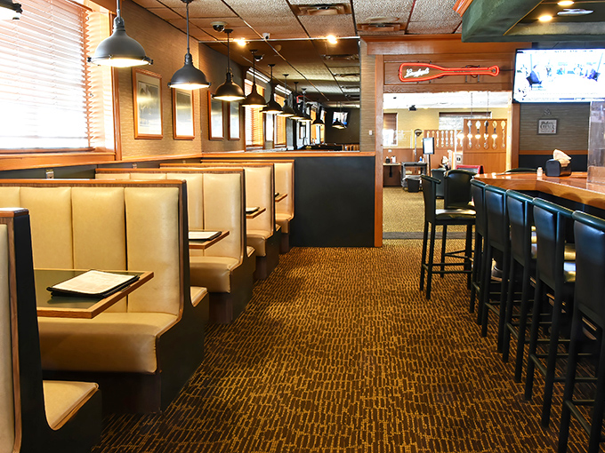 Cozy booths and warm wood tones create that perfect "everybody knows your name" vibe. This isn't trendy dining—it's timeless comfort.