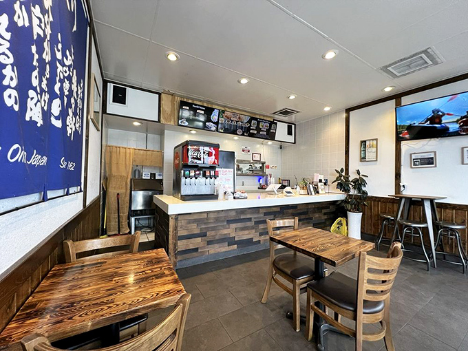 The cozy interior speaks volumes about priorities – minimal décor, maximum focus on the food. Those wooden tables have witnessed countless "first bite" epiphanies.