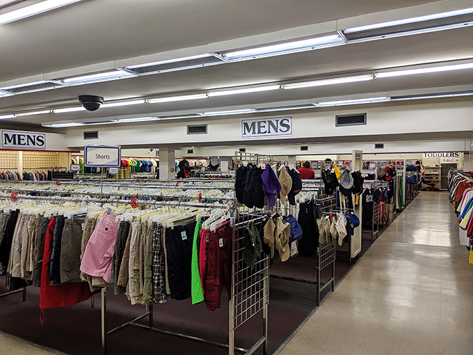 Row after orderly row of men's clothing awaits, organized with military precision that would make Marie Kondo stand at attention.