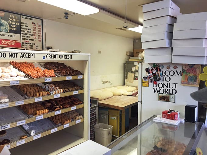 Step inside and breathe deeply—that heavenly aroma of fresh dough and warm sugar is your first taste of Donut World magic.