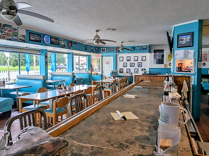 Step inside and suddenly you're in 1955, where turquoise booths invite long conversations and the counter promises front-row seats to the breakfast show.