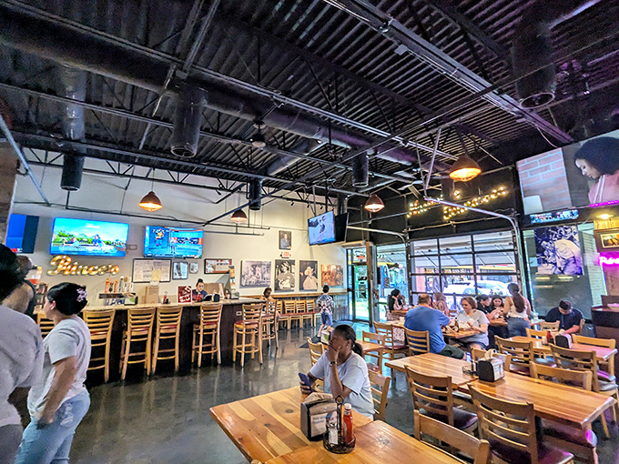 Modern industrial meets Southern hospitality in this airy dining room where strangers become friends, united by their shared chicken-induced euphoria.