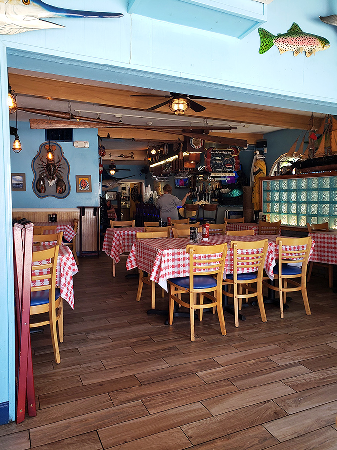 Classic red-checkered tablecloths and nautical decor transport you straight to coastal Maine—no passport or winter coat required.