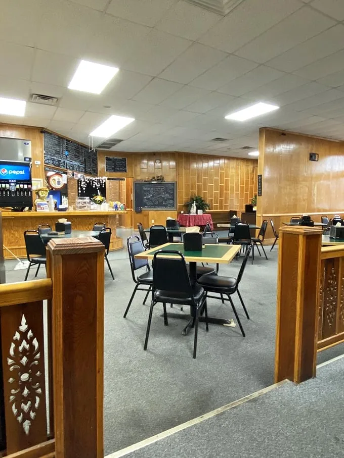 Wood paneling that's witnessed thousands of first dates and family celebrations. This dining room doesn't need Instagram filters—it's authentically retro without trying.