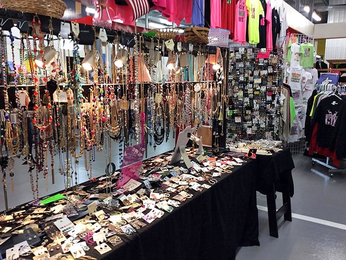 A treasure trove of sparkle awaits at this jewelry booth, where necklaces dangle like colorful fishing lures ready to catch compliments instead of bass.