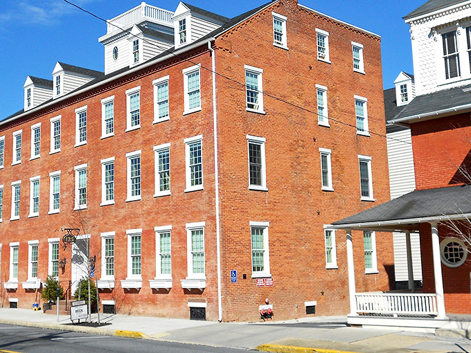 This brick beauty stands as proof that some buildings age like fine wine, getting better with every passing decade.