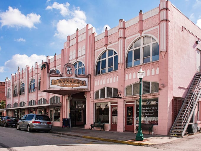 The Rattlers Old West Saloon's flamingo-pink Art Deco façade might be the most Florida way to house an Old West-themed establishment ever conceived.