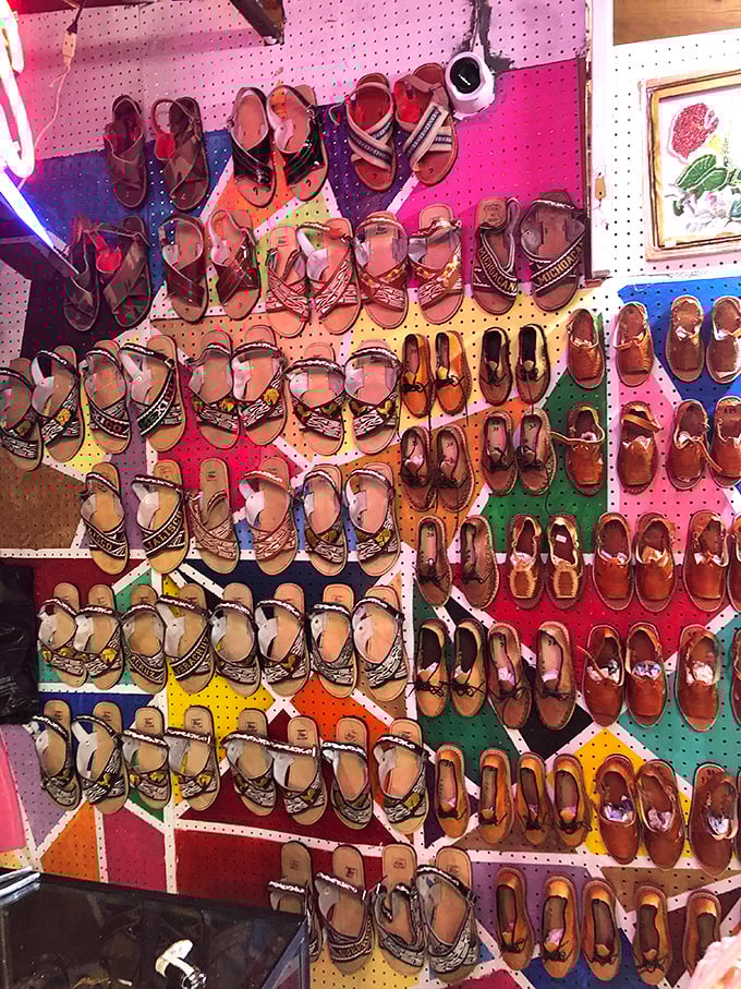 A rainbow of leather sandals creates a dizzying display of summer possibilities. Finding just one pair might be the day's biggest challenge—they're all calling your name.