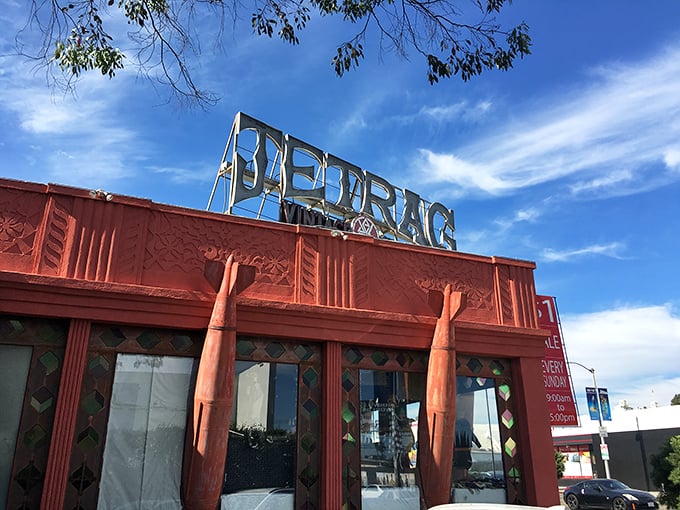 The iconic Jet Rag sign beckons like a vintage Hollywood marquee promising treasures within.