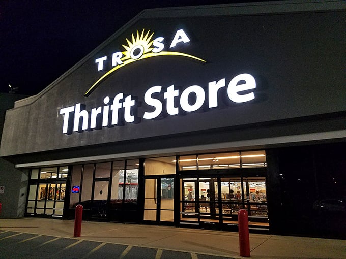 Night or day, this thrifter's paradise glows with promise – each illuminated window a preview of treasures waiting inside.