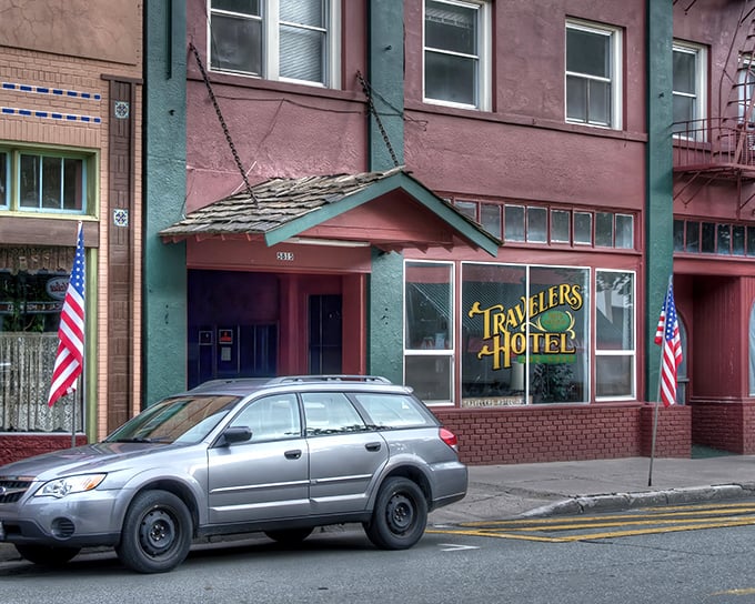 The Travelers Hotel isn't just a place to stay—it's a time machine with modern plumbing. This historic gem whispers railroad tales while you sleep.