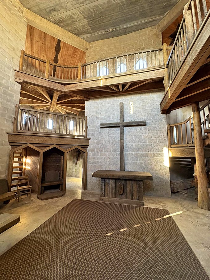 The chapel's soaring wooden galleries and simple cross create a sanctuary that whispers of ancient prayers.