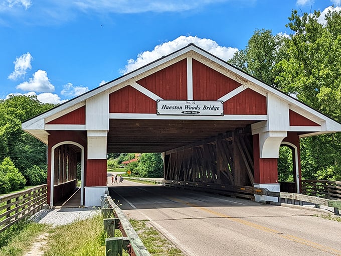 The iconic Hueston Woods covered bridge welcomes travelers with classic red-and-white charm. Crossing it feels like stepping into a simpler, more peaceful era.