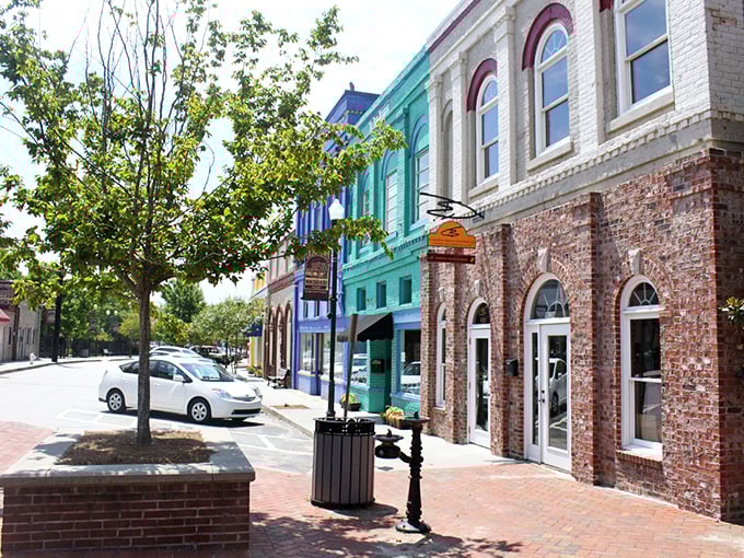 A street that Instagram filters wish they could replicate. The brick sidewalks and colorful historic buildings create Olde Town's distinctive architectural personality.