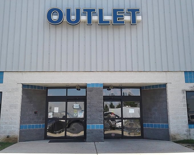 Blue signage beckons thrift adventurers through these doors. The retail equivalent of "Open Sesame" for those who know the magic of the bins awaits inside.