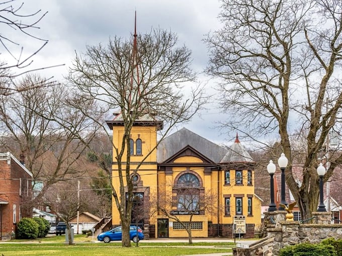 The sunshine-yellow First Baptist Church isn't just architectural eye candy—it's a community cornerstone where retirees find both spiritual fulfillment and potluck dinners worth setting alarms for.
