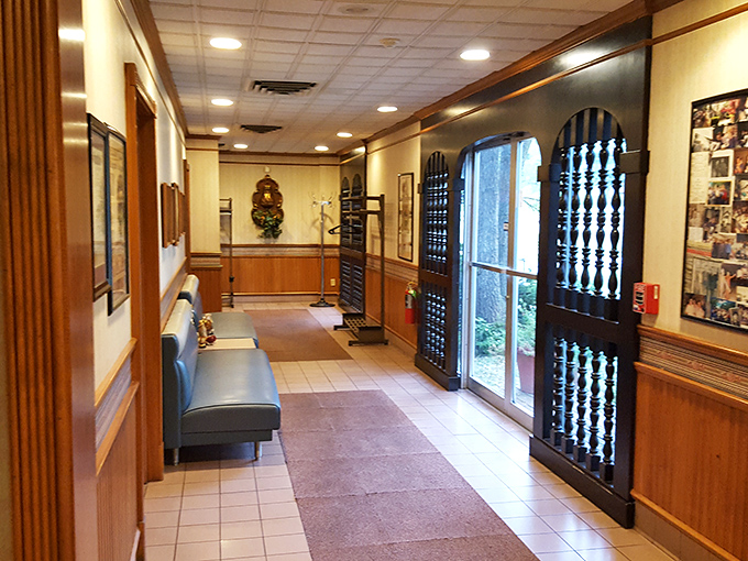 Step inside and you're greeted by wood paneling and ornate doors that whisper, "The 1970s called—they're not getting this decor back because it's perfect."